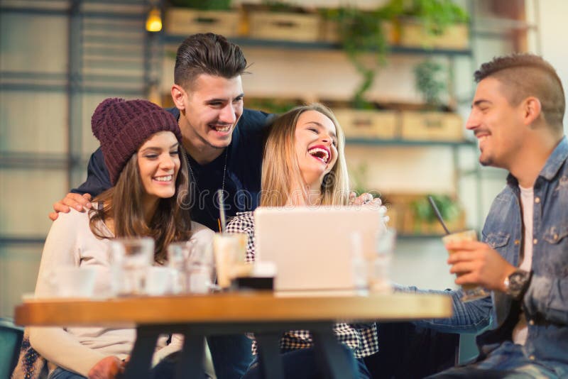Group of Young People Sitting in a Coffee Shop Stock Image - Image of ...