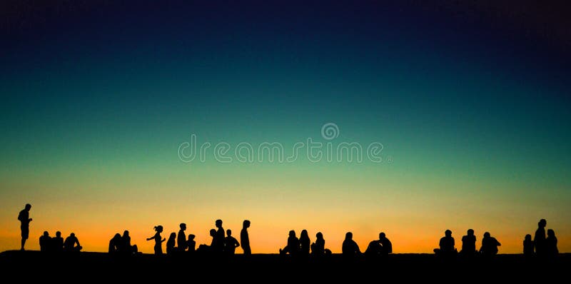 Group of Young People Sitting on Wall at Sunset Stock Photo - Image of ...
