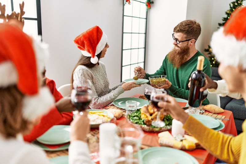 Group of Young People Smiling Happy Having Christmas Dinner at Home ...