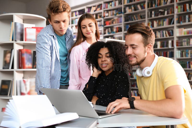 Group of Young People Studying at Table Stock Image - Image of ...