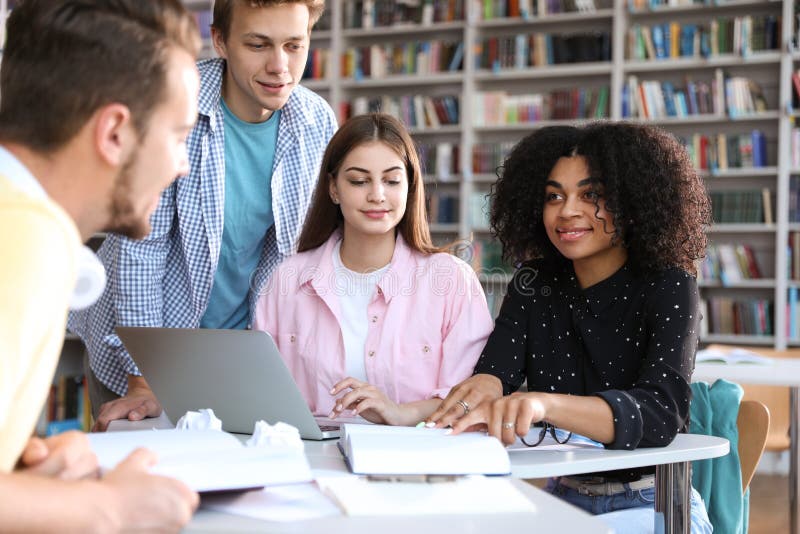 Group of Young People Studying at Table Stock Photo - Image of ...
