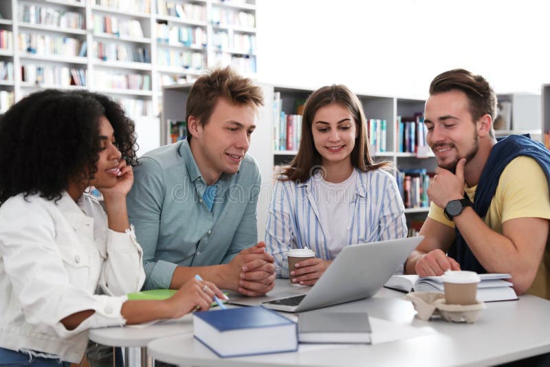 Group of Young People Studying at Table Stock Image - Image of adult ...