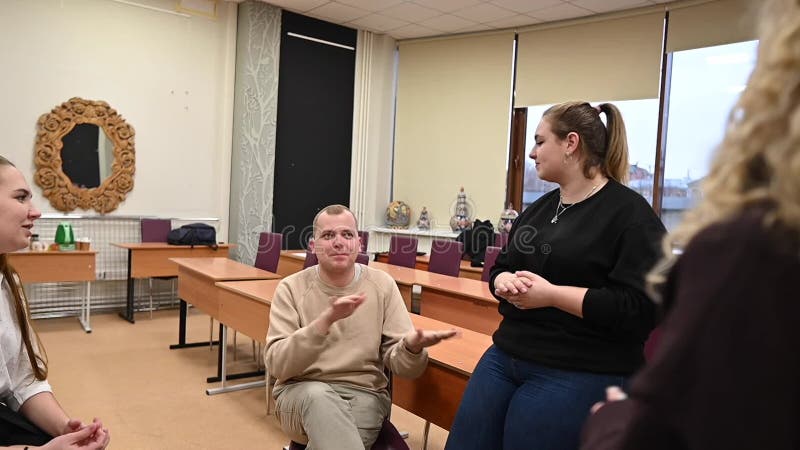 A Group of Young People Talking in Sign Language. Stock Video - Video ...