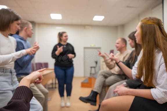 A Group of Young People Talking in Sign Language. Stock Photo - Image ...