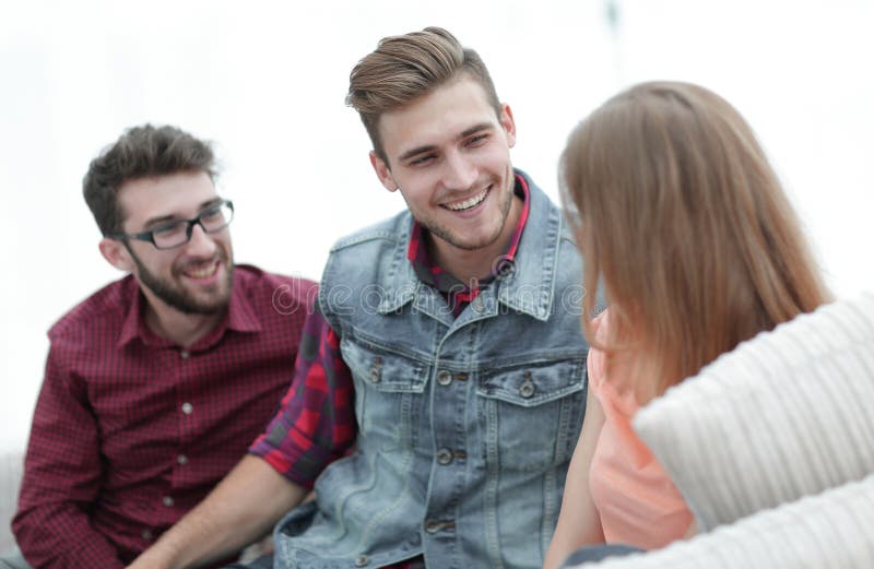 Group of Young People Talking Sitting on the Couch Stock Photo - Image ...