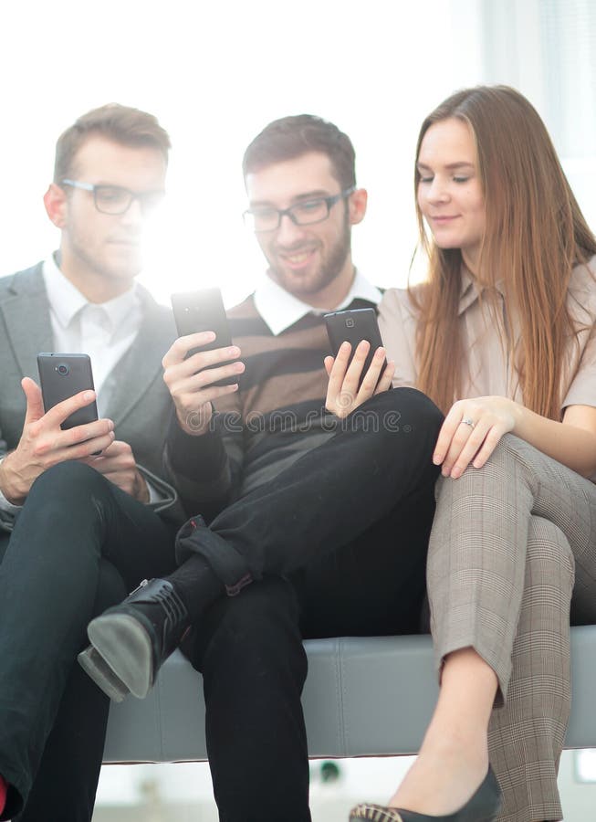 Group of Young People Use Their Phones Stock Photo - Image of community ...