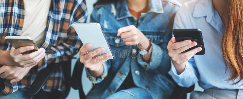 Group of Young People Using and Looking at Mobile Phone Together Stock ...