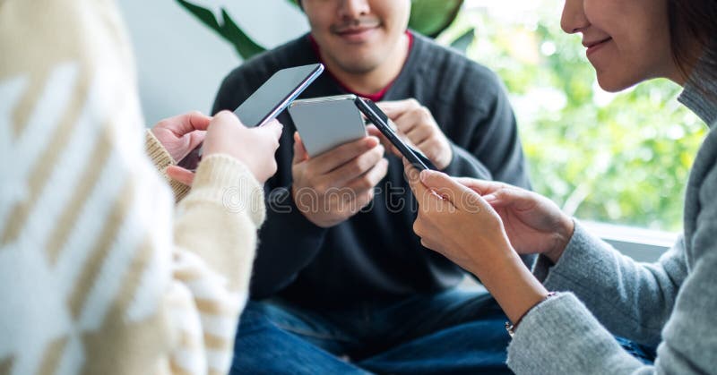 People Using and Looking at Mobile Phone Together Stock Image - Image ...