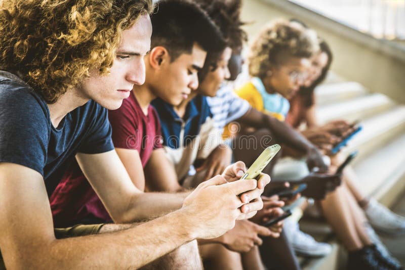Group of Young People Using Smart Mobile Phone Device Together ...