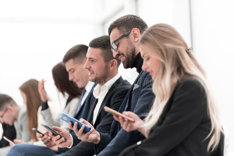 Group of Young People Waiting, Sitting in the Queue Stock Image - Image ...