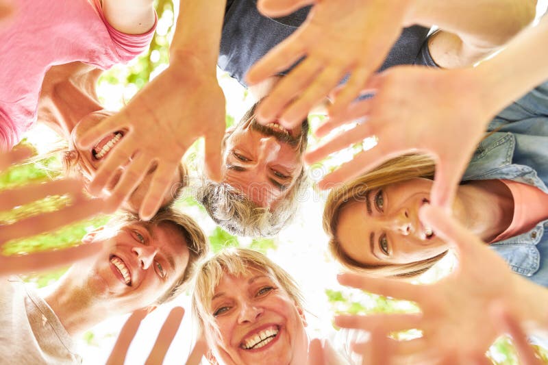 Group of Young People Waving in Greeting As a Team Stock Image - Image ...