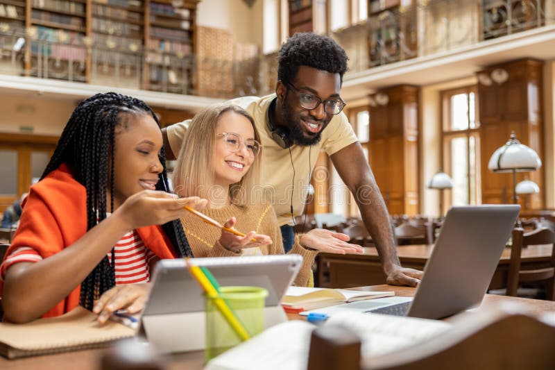 Group of Young People Working Together and Looking Involved Stock Image ...