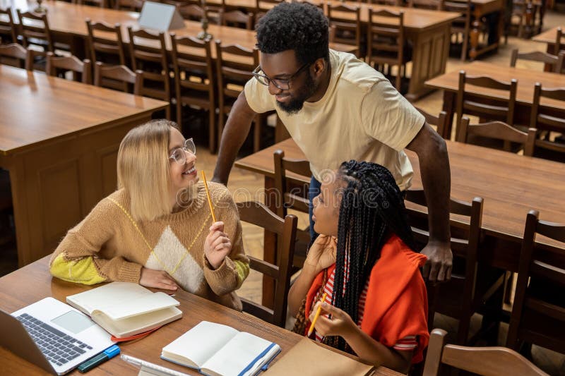 Group of Young People Working Together and Looking Involved Stock Image ...