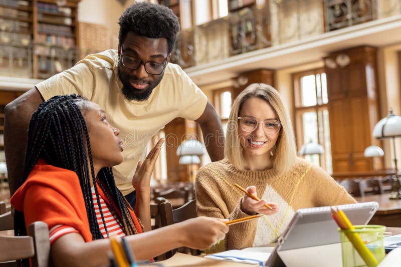 Group of Young People Working Together on the Project Stock Photo ...