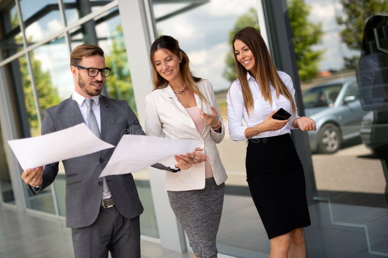 Group of Perspective Designers Discussing in Front of Office Stock ...