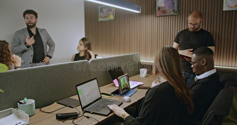Group of Young Professionals Collaborating in a Modern Office, Working ...