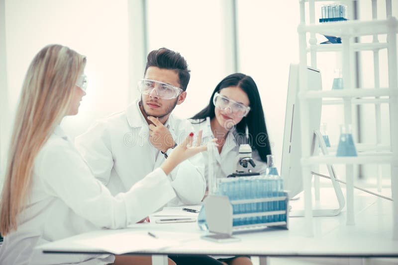 Group of Young Scientists Discussing the Problems of Coronavirus Stock ...