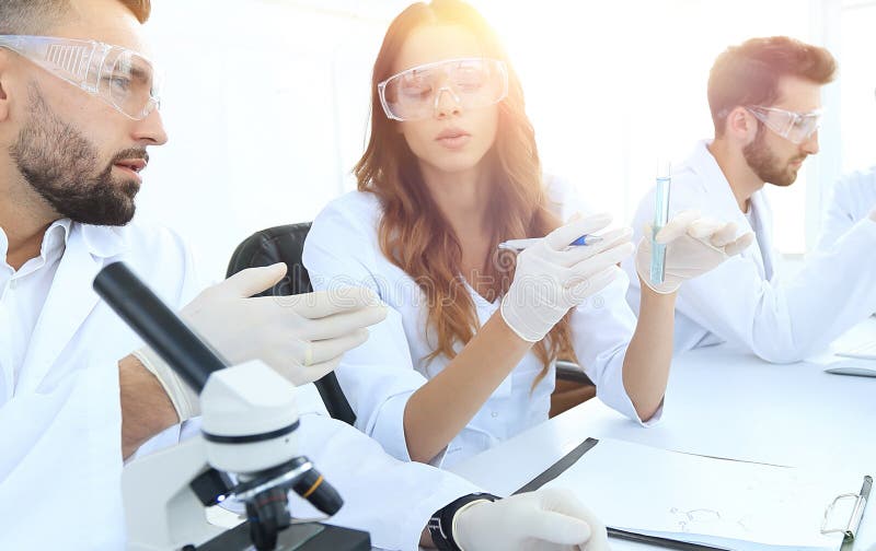 Group of Young Scientists Discussing the Results of a Study Stock Photo ...