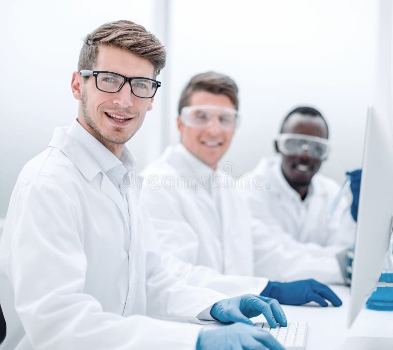 Group of Young Scientists in the Laboratory Stock Photo - Image of ...