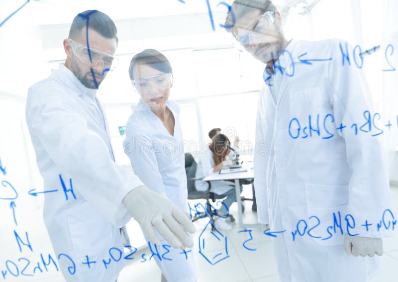 Group of Young Scientists Talking in a Lab Stock Image - Image of ...