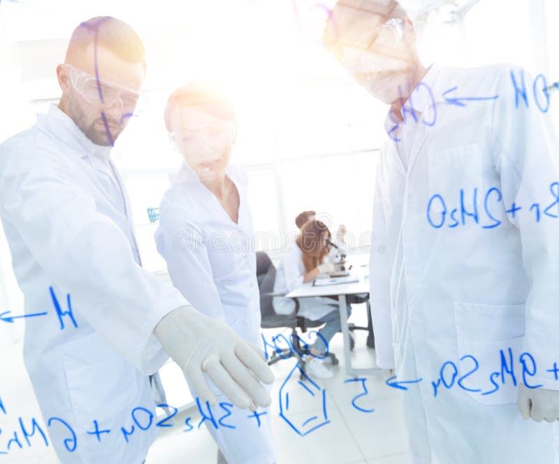 Group of Young Scientists Talking in a Lab Stock Image - Image of ...