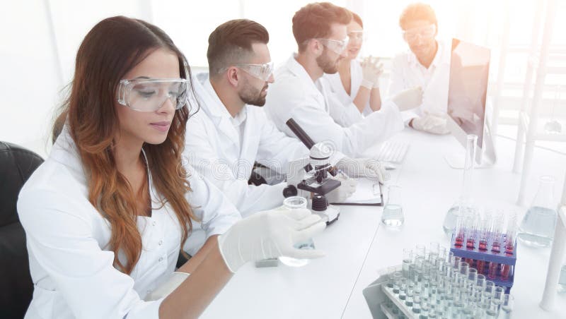 Group of Young Scientists Working in the Laboratory. Stock Image ...