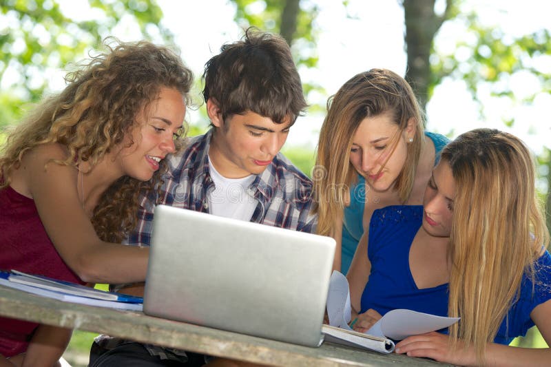 Group of Young Student Using Laptop Outdoor Stock Image - Image of ...