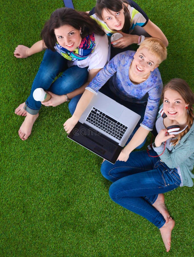 Group of Young Student Using Laptop Together Stock Image - Image of ...
