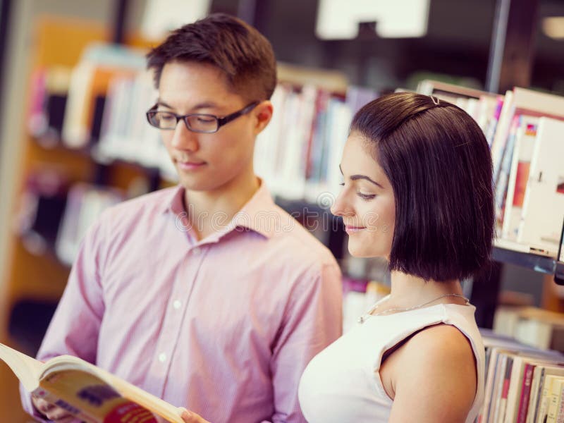 Group of Young Students at the Library Stock Photo - Image of ...