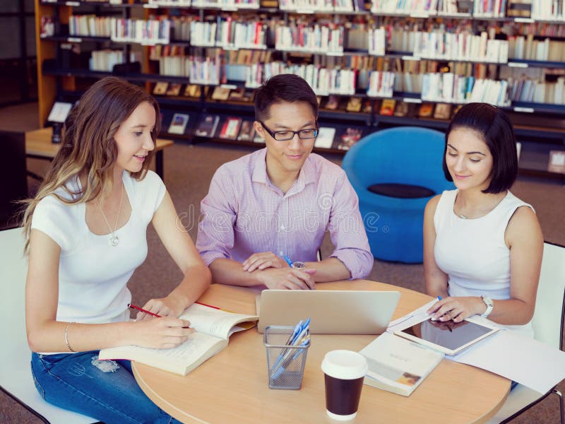Group of Young Students at the Library Stock Photo - Image of indoor ...