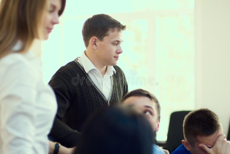 A Group of Young Students Solve a Problem Stock Photo - Image of ...