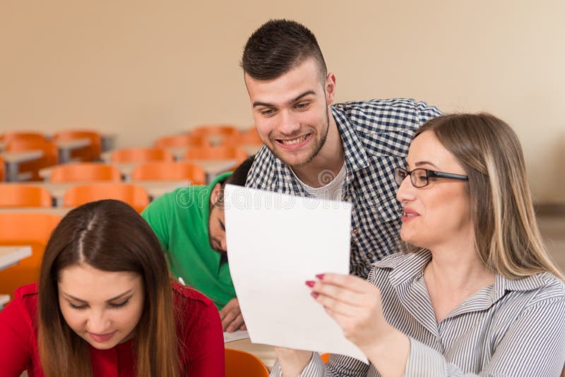 Group of Young Students Study One is Cheating Stock Photo - Image of ...