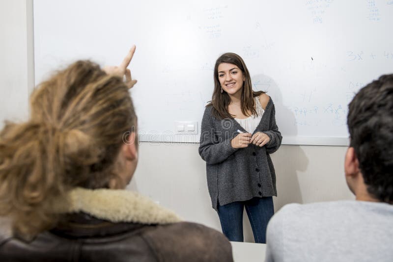 Group of Young Students Taking Lesson at University Classroom with Girl ...