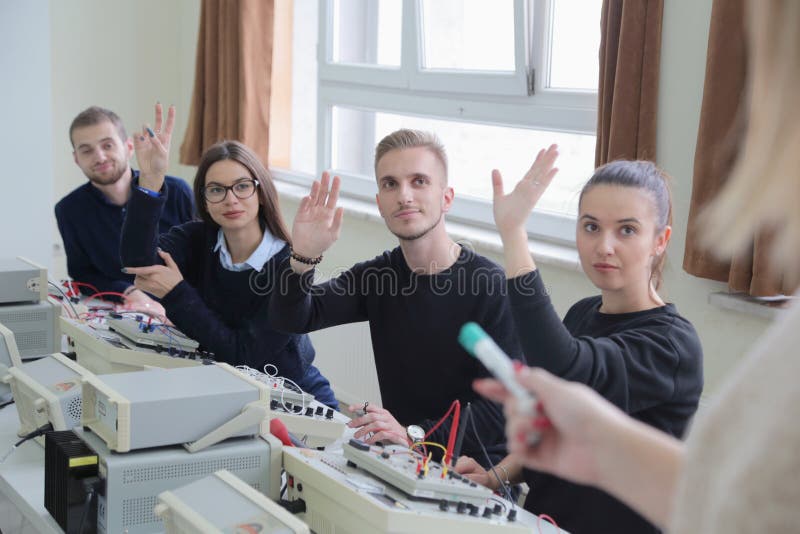 Group of Young Students in Technical Vocational Training with Teacher ...