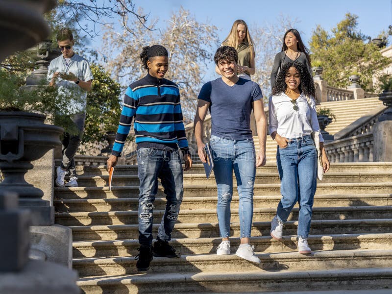 Group of Young Students Walking on Some Stairs Stock Image - Image of ...