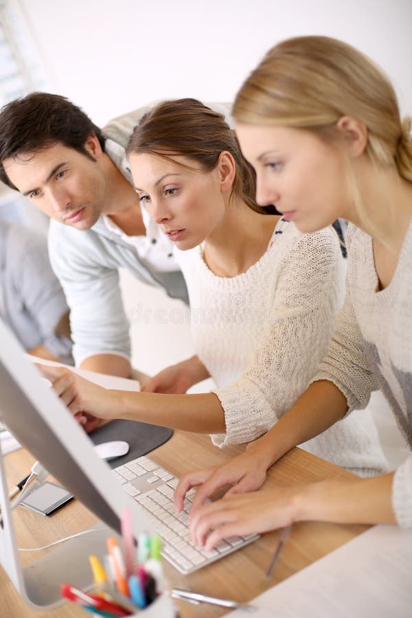 Group of Young Students Working on Computer Stock Photo - Image of ...