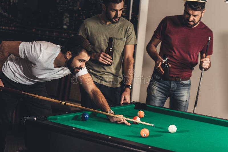 Group of Young Successful Handsome Men Playing in Pool Stock Photo ...