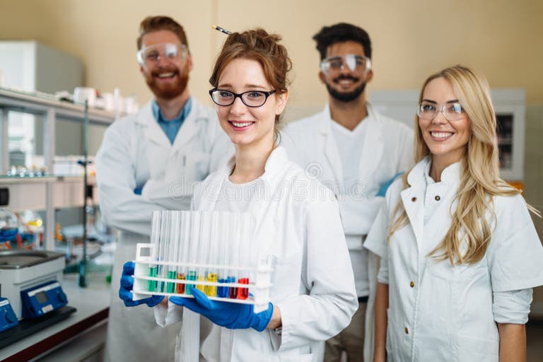 Group of Young Successful Scientists Posing for Camera Stock Photo ...