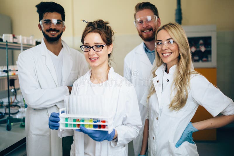 Group of Young Successful Scientists Posing for Camera Stock Image ...