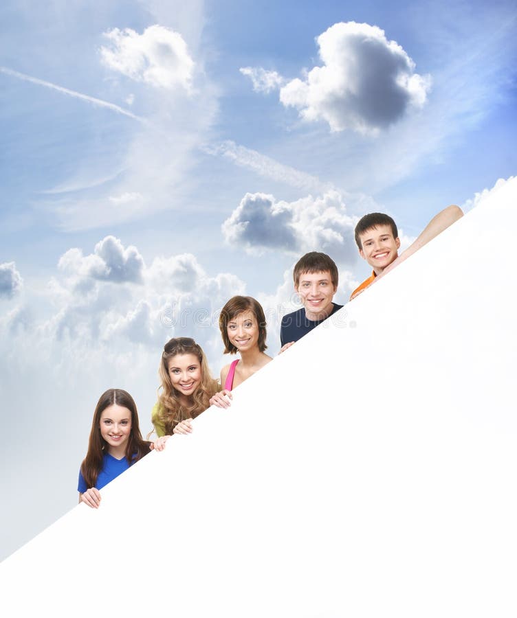 A Group Of Young Teenagers Holding A White Banner Stock Image - Image ...