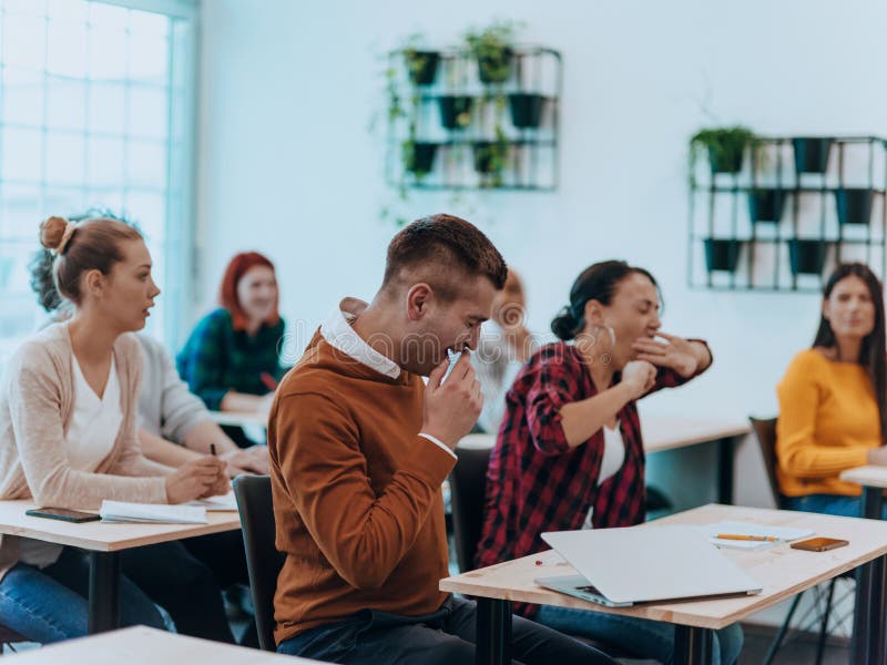 A Group of Young Tired People Gathered for a Presentation of the Work ...