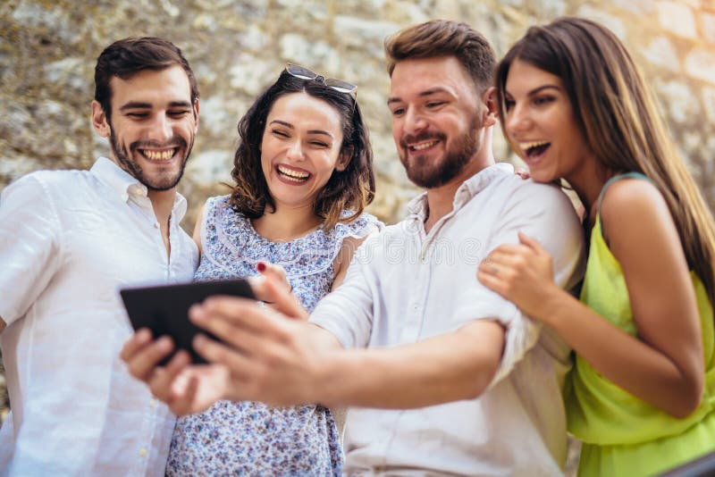Group of Young Tourist Friends with Digital Tablet Stock Photo - Image ...