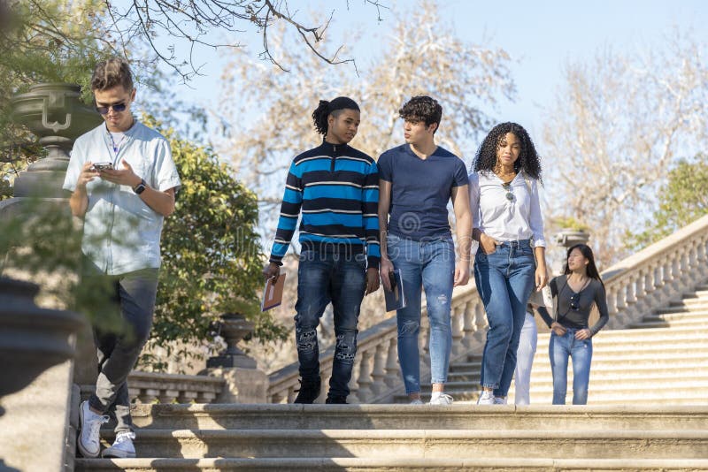 Group of Young Students Walking on Some Stairs Stock Image - Image of ...