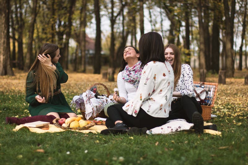 Group of Young Women Out on a Fun Picnic in the Park Stock Photo ...