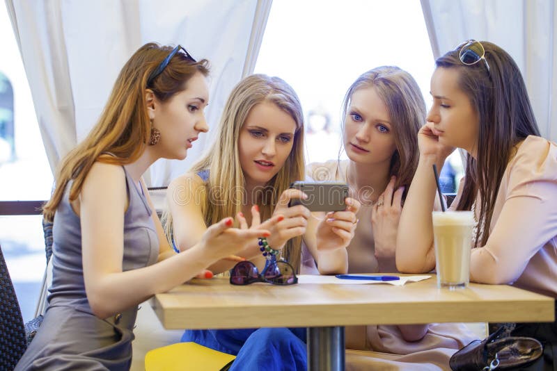 Group of Young Women Sitting Around Table Eating Dessert Stock Image ...