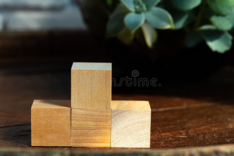 Groupped Wooden Square Blocks on Dark Wooden Table Stock Photo - Image ...