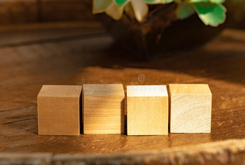 Groupped Wooden Square Blocks on Dark Wooden Table Stock Photo - Image ...