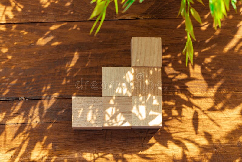 Groupped Wooden Square Blocks on Dark Wooden Table Stock Photo - Image ...
