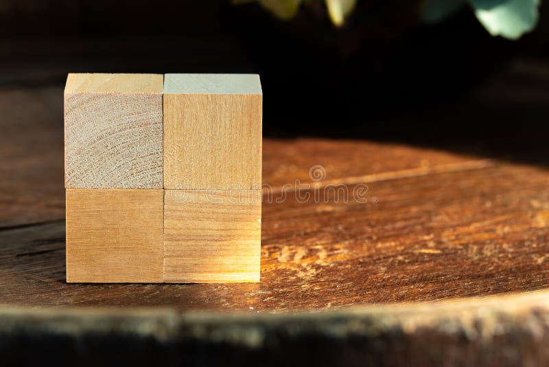 Groupped Wooden Square Blocks on Dark Wooden Table Stock Photo - Image ...