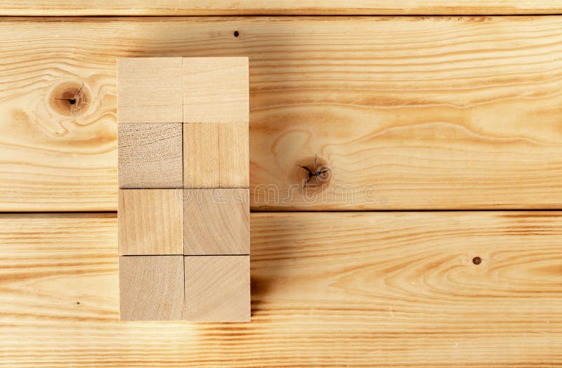 Groupped Wooden Square Blocks on Dark Wooden Table Stock Photo - Image ...